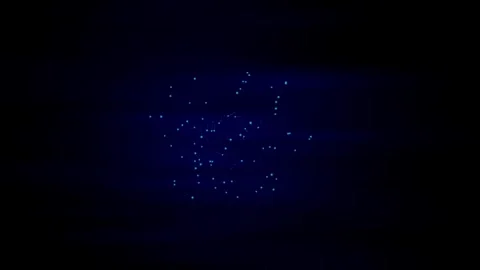 Neon blue vortex of particles of light i... | Stock Video | Pond5