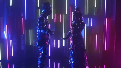 Neon light couple metallic shiny couple ... | Stock Video | Pond5