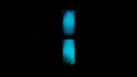 neon light source on a black background | Stock Video | Pond5