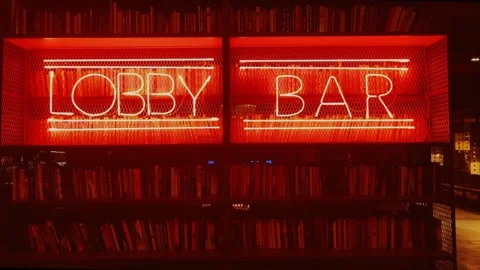 Neon sign inside dim bar | Stock Video | Pond5