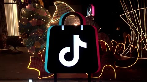 Neon signs glowing of the TikTok Shop lo... | Stock Video | Pond5