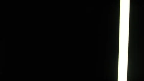 Neon White LED Sword Moves From Side to ... | Stock Video | Pond5