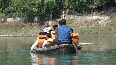 Nepali Tourists taking a boat ride on a ... | Stock Video | Pond5