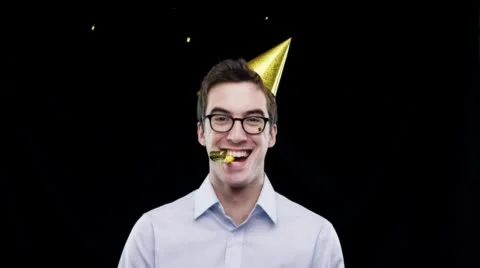 Nerd guy wearing party hat confetti show... | Stock Video | Pond5