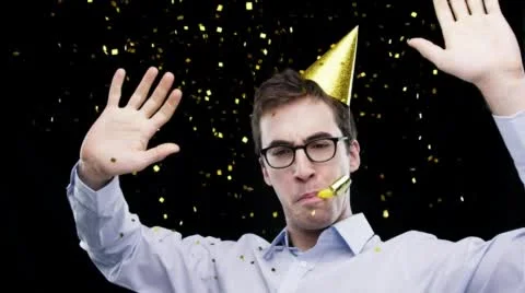 Nerd guy wearing party hat dancing slow ... | Stock Video | Pond5