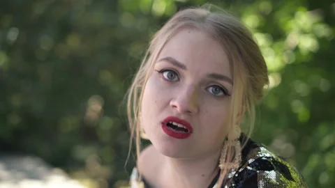 Nervous drunk woman talking looking at c... | Stock Video | Pond5