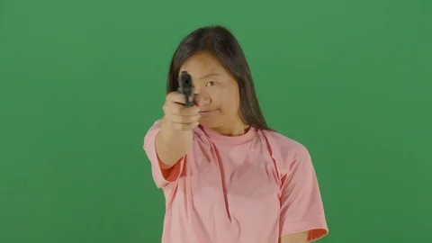 Girl Shaking Gun Stock Footage ~ Royalty Free Stock Videos | Pond5