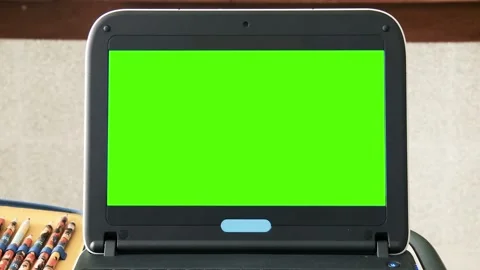 Netbook Computer With Green Screen on Pr... | Stock Video | Pond5