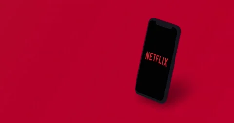 Netflix mobile app logo on phone screen ... | Stock Video | Pond5