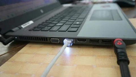 The network cable is being connected to ... | Stock Video | Pond5