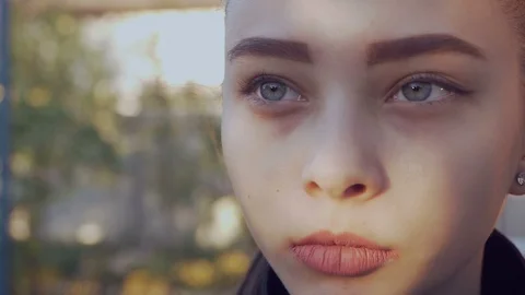 Neutral face of a teenage girl with beau... | Stock Video | Pond5