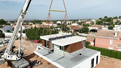 New modern home being put in place by cr... | Stock Video | Pond5