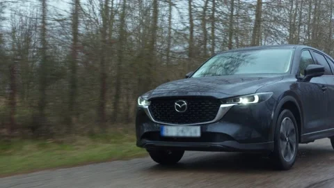 New modern SUV Mazda cx 30 model driving... | Stock Video | Pond5