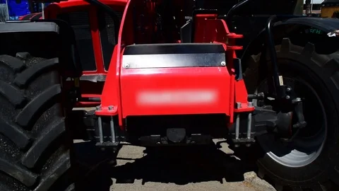 The new tractor with front and back side... | Stock Video | Pond5