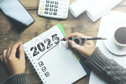 New year resolutions 2025 on desk. 2025 goals list Stock Image #293134641