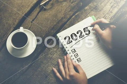 New year resolutions 2025 on desk. 2025 goals list ~ Hi Res #293134648