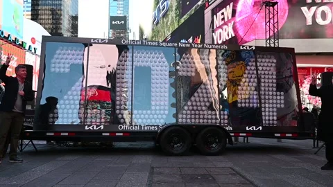 New Year's Eve Numerals Arrive In Times ... | Stock Video | Pond5