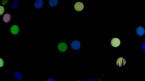 New Years lights blinking on a black bac... | Stock Video | Pond5
