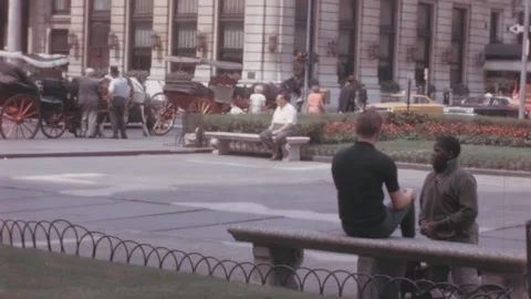 New York - 1964: people sit on a bench i... | Stock Video | Pond5