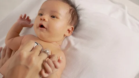 newborn infant baby being checked with s... | Stock Video | Pond5