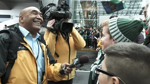 News Reporter Interviewing Sport Fans | Stock Video | Pond5