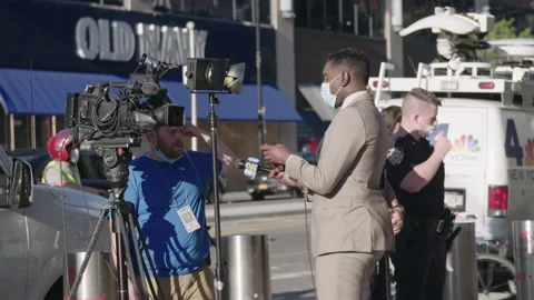 News TV Anchor wearing Face Mask getting... | Stock Video | Pond5