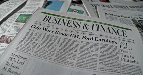 Newspaper Coverage of Chip Shortage hurt... | Stock Video | Pond5