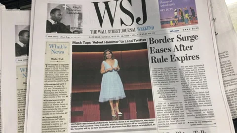 Newspaper Coverage of Elon Musk hires ex... | Stock Video | Pond5