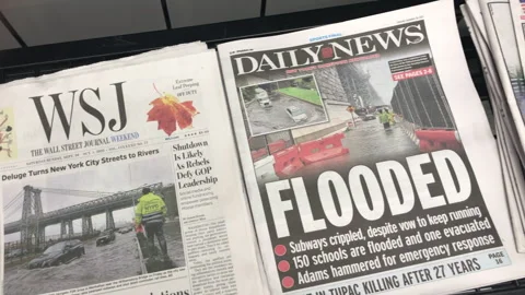 Newspaper Coverage of Heavy Flooding in ... | Stock Video | Pond5