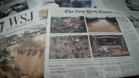 Newspaper Coverage of Heavy rains cause ... | Stock Video | Pond5