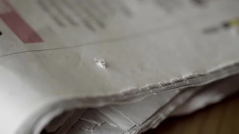 Newspaper pages extreme close up 4K stoc... | Stock Video | Pond5