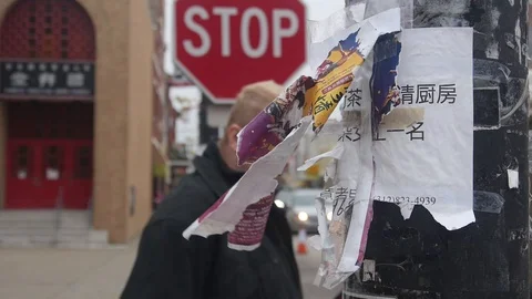 Newspaper Stuck On Street Pole In Front ... | Stock Video | Pond5