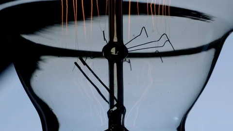 Newton Lightbulb Stem And Wiring Being P... | Stock Video | Pond5
