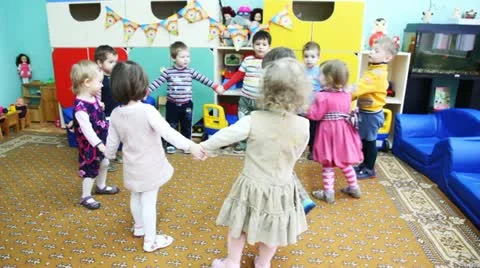 Nice kids holding hands, standing in cir... | Stock Video | Pond5