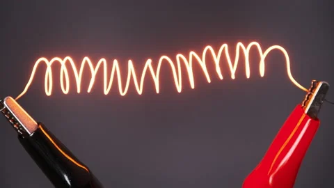 Nichrome Filament Glowing to Red Under H... | Stock Video | Pond5