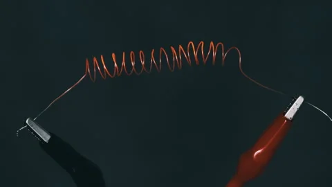 Nichrome Wire Glowing to Red Under High ... | Stock Video | Pond5