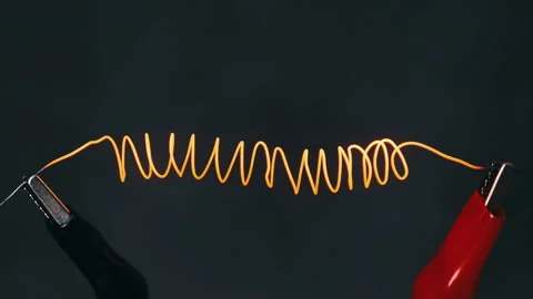 The Nichrome Wire Heats Up to Red with S... | Stock Video | Pond5