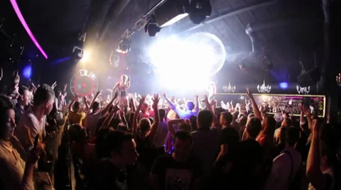 Night club crowd hands up and CO2 jet co... | Stock Video | Pond5