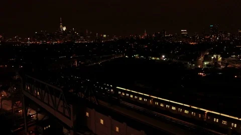 night flying behind subway as it heads t... | Stock Video | Pond5