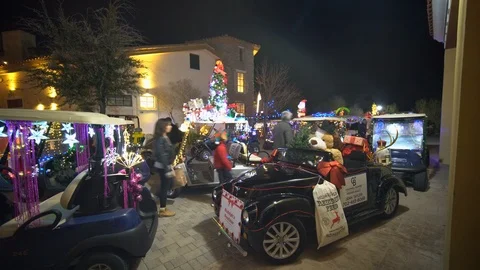 Night golf cart parade in Lake Las Vegas... | Stock Video | Pond5