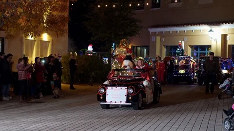 Night golf cart parade in Lake Las Vegas... | Stock Video | Pond5