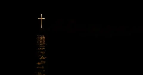 Night light with a church cross. | Stock Video | Pond5