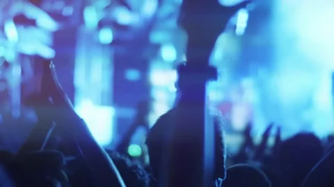 Night rock concert front row crowd cheer... | Stock Video | Pond5