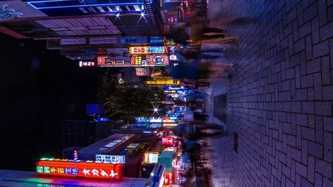 A night timelapse of the neon town in Se... | Stock Video | Pond5