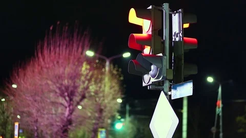Night traffic light. Serial signals red,... | Stock Video | Pond5