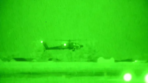 Night vision imagery of Apache helicopte... | Stock Video | Pond5