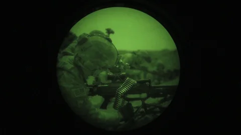 Night vision imagery of sniper setting m... | Stock Video | Pond5