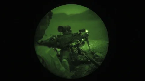 Night vision imagery of soldier firing m... | Stock Video | Pond5