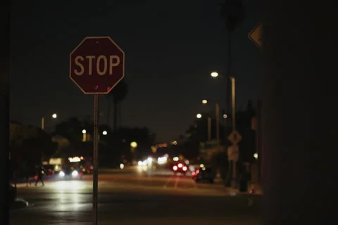Nighttime Urban Street Scene with Stop S... | Stock Video | Pond5