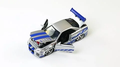 Nissan Skyline GTR R34 doors open on whi... | Stock Video | Pond5